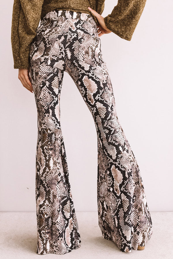 Leave Em' Wanting More Snake Print Flare • Impressions Online Boutique