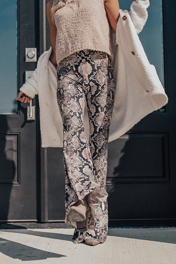 Leave Em' Wanting More Snake Print Flare • Impressions Online Boutique